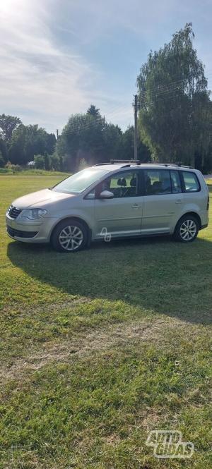 Grey Volkswagen Touran 2010 in Kazlu Ruda, with an engine capacity of 1.40 L and mileage of 240 thousand km for 1800 €, photo 8 on AUTOMOTO.COM.LV