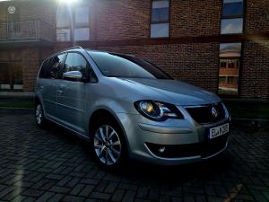 Grey Volkswagen Touran 2010 in Marijampole, with an engine capacity of 1.39 L and mileage of 212 thousand km for 4650 €, photo 3 on AUTOMOTO.COM.LV