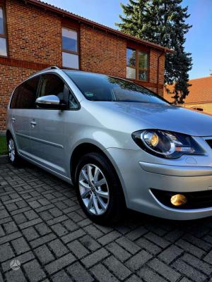 Grey Volkswagen Touran 2010 in Marijampole, with an engine capacity of 1.39 L and mileage of 212 thousand km for 4650 €, photo 11 on AUTOMOTO.COM.LV