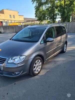 Grey Volkswagen Touran 2010 in Klaipeda, with an engine capacity of 1.39 L and mileage of 199 thousand km for 4100 €, photo  on AUTOMOTO.COM.LV