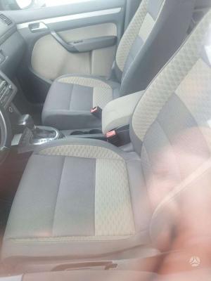 Grey Volkswagen Touran 2010 in Utena, with an engine capacity of 1.90 L and mileage of 155 thousand km for 4400 €, photo 7 on AUTOMOTO.COM.LV