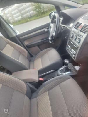 Grey Volkswagen Touran 2010 in Utena, with an engine capacity of 1.90 L and mileage of 155 thousand km for 4400 €, photo 9 on AUTOMOTO.COM.LV