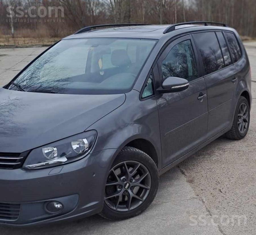 Pelēks Volkswagen Touran 2011 Rīga, ar dzinēja tilpumu 2.00 L un nobraukumu 240 tūkst. km par 7200 €, foto 4 vietnē AUTOMOTO.COM.LV