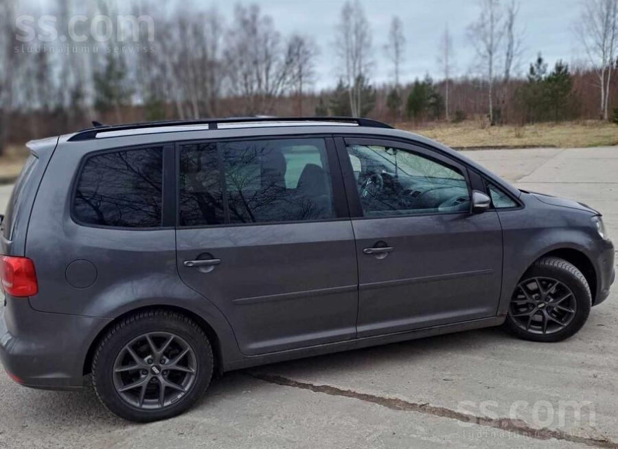 Pelēks Volkswagen Touran 2011 Rīga, ar dzinēja tilpumu 2.00 L un nobraukumu 240 tūkst. km par 7200 €, foto 8 vietnē AUTOMOTO.COM.LV