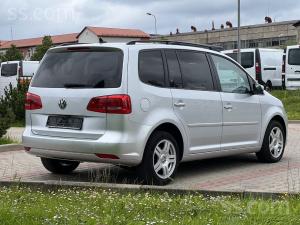 Grey Volkswagen Touran 2011 in Cesis, with an engine capacity of 2.00 L and mileage of 257 thousand km for 7550 €, photo 3 on AUTOMOTO.COM.LV
