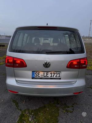Grey Volkswagen Touran 2011 in Vilkaviskis, with an engine capacity of 1.60 L and mileage of 345 thousand km for 4800 €, photo 7 on AUTOMOTO.COM.LV