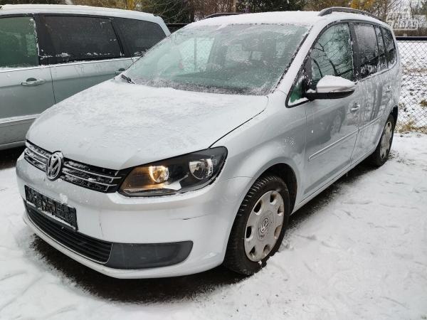 Grey Volkswagen Touran 2011 in Vilnius, with an engine capacity of 1.40 L and mileage of 270 thousand km for 4650 €, photo 2 on AUTOMOTO.COM.LV