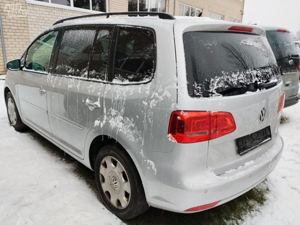 Grey Volkswagen Touran 2011 in Vilnius, with an engine capacity of 1.40 L and mileage of 270 thousand km for 4650 €, photo 3 on AUTOMOTO.COM.LV