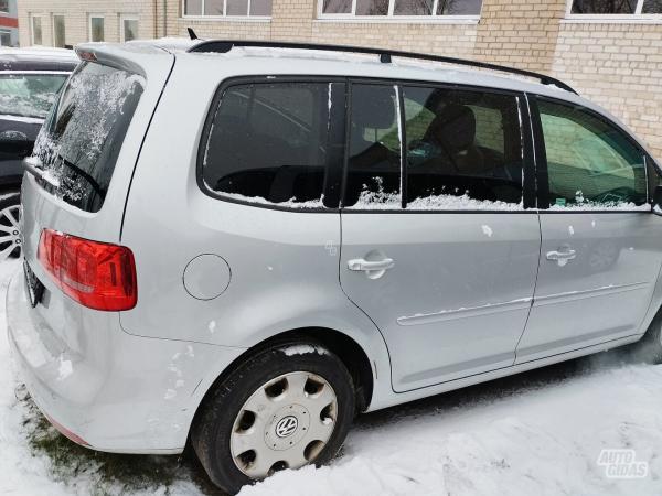 Grey Volkswagen Touran 2011 in Vilnius, with an engine capacity of 1.40 L and mileage of 270 thousand km for 4650 €, photo 4 on AUTOMOTO.COM.LV