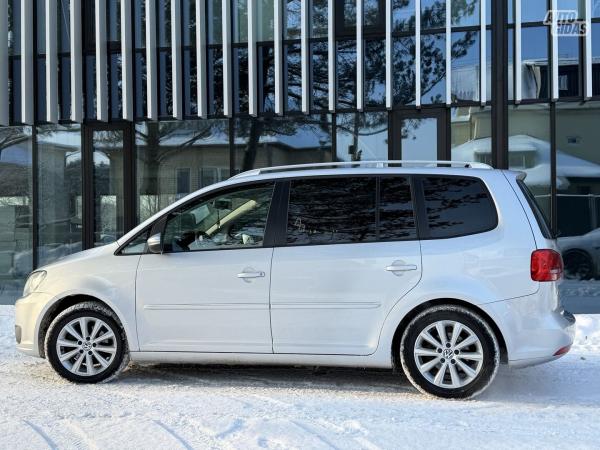 Grey Volkswagen Touran 2011 in Kaunas, with an engine capacity of 1.20 L and mileage of 215 thousand km for 4390 €, photo 1 on AUTOMOTO.COM.LV
