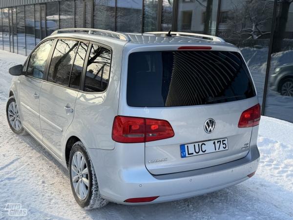 Grey Volkswagen Touran 2011 in Kaunas, with an engine capacity of 1.20 L and mileage of 215 thousand km for 4390 €, photo 3 on AUTOMOTO.COM.LV