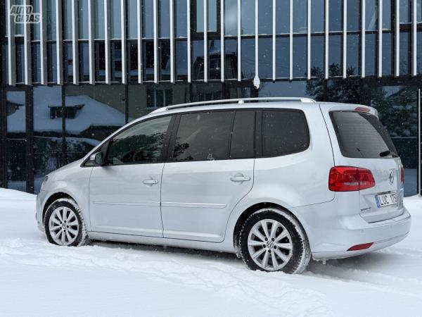 Grey Volkswagen Touran 2011 in Kaunas, with an engine capacity of 1.20 L and mileage of 215 thousand km for 4390 €, photo 9 on AUTOMOTO.COM.LV