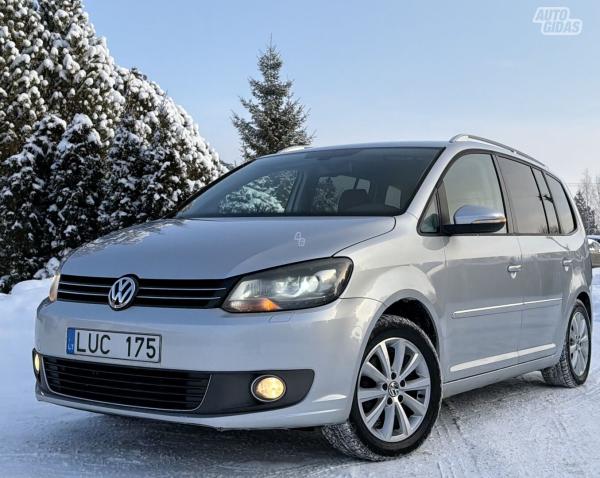 Grey Volkswagen Touran 2011 in Kaunas, with an engine capacity of 1.20 L and mileage of 215 thousand km for 4399 €, photo 1 on AUTOMOTO.COM.LV