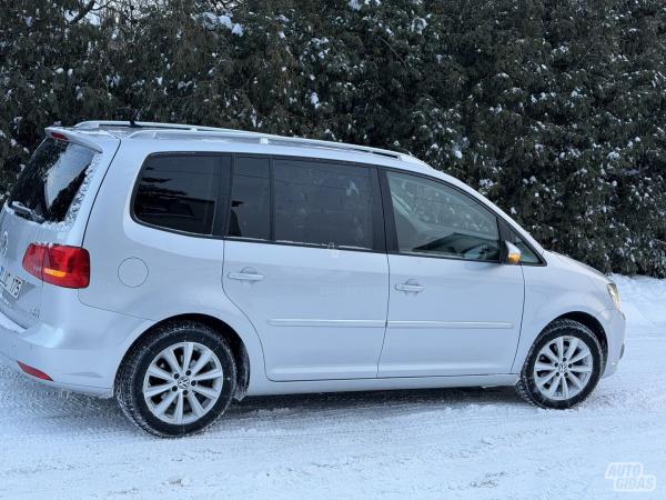 Grey Volkswagen Touran 2011 in Kaunas, with an engine capacity of 1.20 L and mileage of 215 thousand km for 4399 €, photo 7 on AUTOMOTO.COM.LV