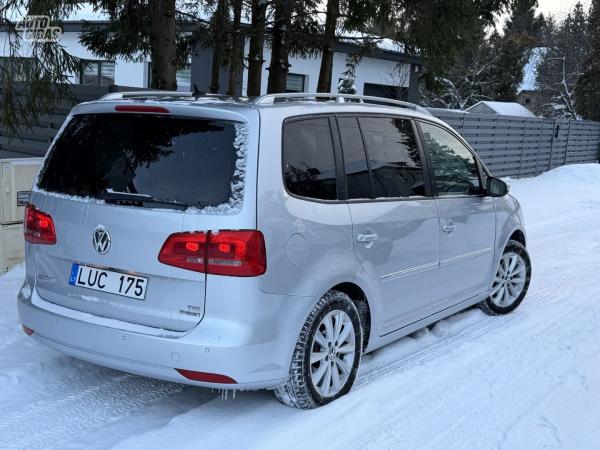 Grey Volkswagen Touran 2011 in Kaunas, with an engine capacity of 1.20 L and mileage of 215 thousand km for 4399 €, photo 8 on AUTOMOTO.COM.LV