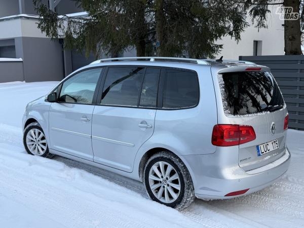 Grey Volkswagen Touran 2011 in Kaunas, with an engine capacity of 1.20 L and mileage of 215 thousand km for 4399 €, photo 9 on AUTOMOTO.COM.LV