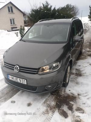 Grey Volkswagen Touran 2011 in Vilnius, with an engine capacity of 2.00 L and mileage of 277 thousand km for 5800 €, photo  on AUTOMOTO.COM.LV