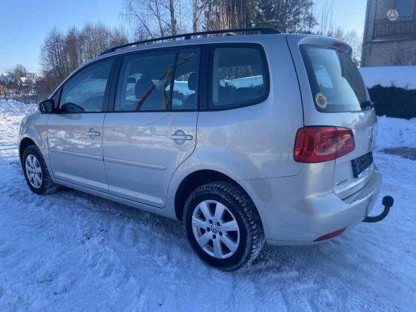 Grey Volkswagen Touran 2011 in Birzai, with an engine capacity of 1.60 L and mileage of 219 thousand km for 4350 €, photo 6 on AUTOMOTO.COM.LV