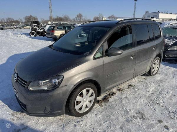 Grey Volkswagen Touran 2011 in Marijampole, with an engine capacity of 1.60 L and mileage of 287 thousand km for 4985 €, photo 1 on AUTOMOTO.COM.LV
