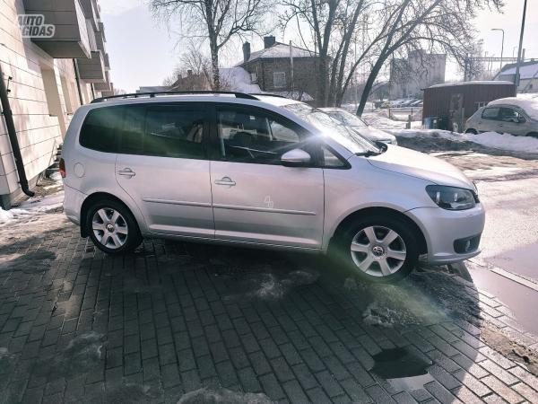 Grey Volkswagen Touran 2011 in Siauliai, with an engine capacity of 1.60 L and mileage of 288 thousand km for 4650 €, photo 6 on AUTOMOTO.COM.LV