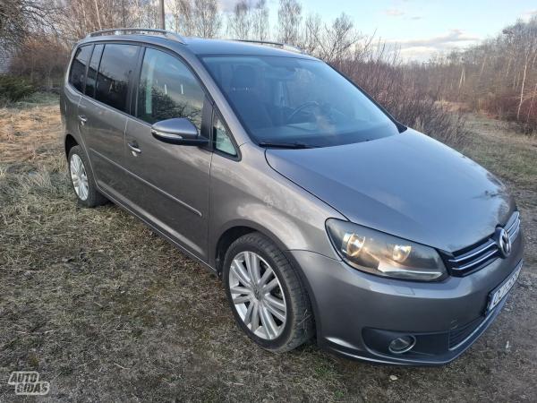 Grey Volkswagen Touran 2011 in Kupiskis, with an engine capacity of 2.00 L and mileage of 225 thousand km for 5350 €, photo 2 on AUTOMOTO.COM.LV