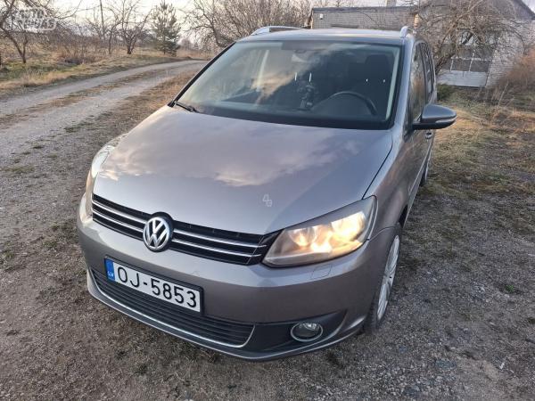 Grey Volkswagen Touran 2011 in Kupiskis, with an engine capacity of 2.00 L and mileage of 225 thousand km for 5350 €, photo 8 on AUTOMOTO.COM.LV
