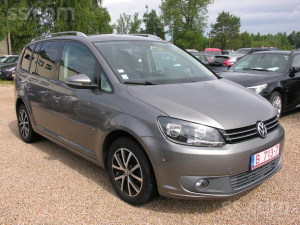 Grey Volkswagen Touran 2011 in Riga, with an engine capacity of 2.00 L and mileage of 0 thousand km for 6450 €, photo 2 on AUTOMOTO.COM.LV