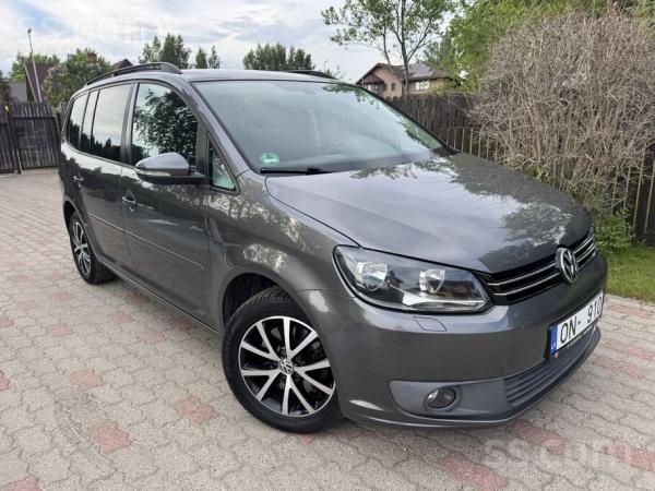 Pelēks Volkswagen Touran 2011 Ogre, ar dzinēja tilpumu 2.00 L un nobraukumu 223 tūkst. km par 6880 €, foto 2 vietnē AUTOMOTO.COM.LV