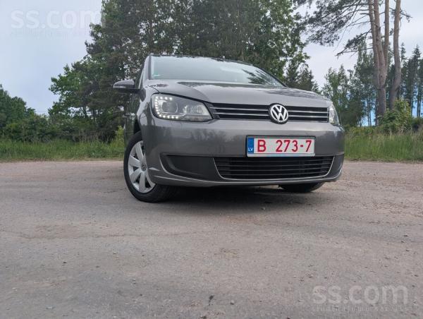 Pelēks Volkswagen Touran 2011 Rīga, ar dzinēja tilpumu 1.40 L un nobraukumu 194 tūkst. km par 5700 €, foto 2 vietnē AUTOMOTO.COM.LV
