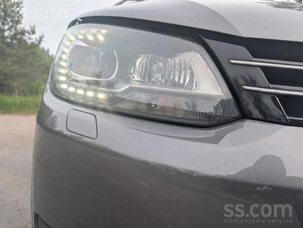 Pelēks Volkswagen Touran 2011 Rīga, ar dzinēja tilpumu 1.40 L un nobraukumu 194 tūkst. km par 5700 €, foto 3 vietnē AUTOMOTO.COM.LV