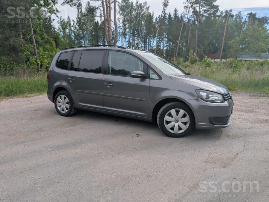 Grey Volkswagen Touran 2011 in Riga, with an engine capacity of 1.40 L and mileage of 194 thousand km for 5700 €, photo 5 on AUTOMOTO.COM.LV