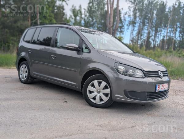 Pelēks Volkswagen Touran 2011 Rīga, ar dzinēja tilpumu 1.40 L un nobraukumu 194 tūkst. km par 5700 €, foto 5 vietnē AUTOMOTO.COM.LV