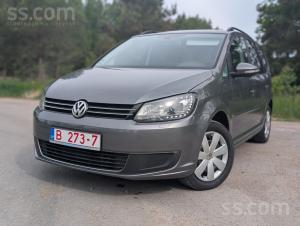 Grey Volkswagen Touran 2011 in Riga, with an engine capacity of 1.40 L and mileage of 194 thousand km for 5700 €, photo 7 on AUTOMOTO.COM.LV