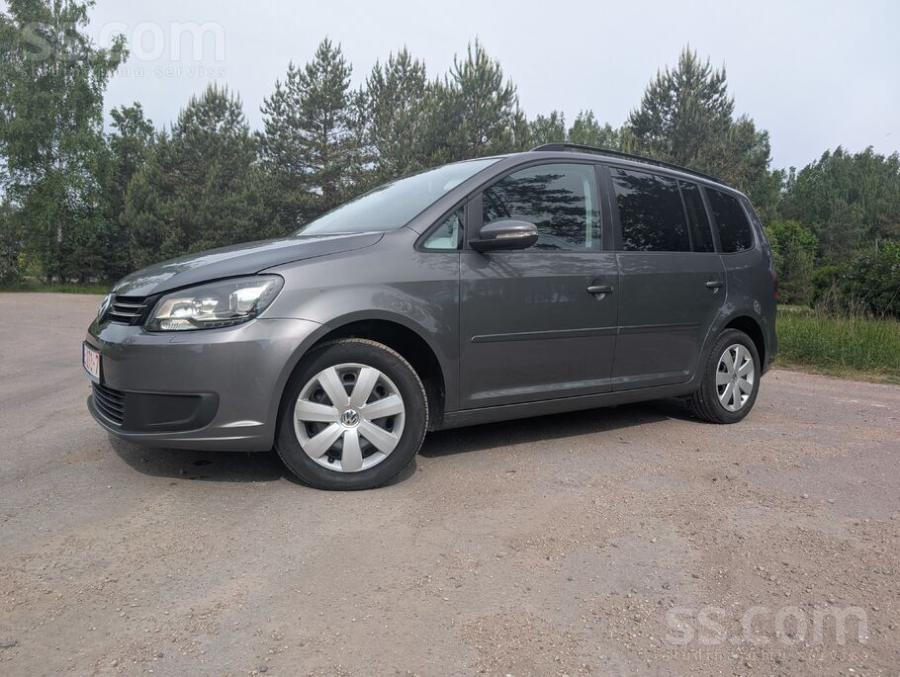Grey Volkswagen Touran 2011 in Riga, with an engine capacity of 1.40 L and mileage of 194 thousand km for 5700 €, photo 8 on AUTOMOTO.COM.LV