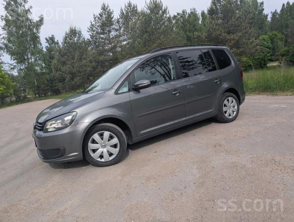 Pelēks Volkswagen Touran 2011 Rīga, ar dzinēja tilpumu 1.40 L un nobraukumu 194 tūkst. km par 5700 €, foto 8 vietnē AUTOMOTO.COM.LV