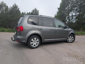 Grey Volkswagen Touran 2011 in Riga, with an engine capacity of 1.40 L and mileage of 194 thousand km for 5700 €, photo 11 on AUTOMOTO.COM.LV