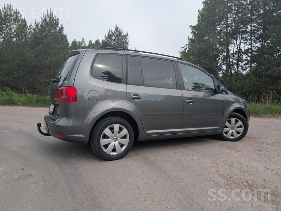 Grey Volkswagen Touran 2011 in Riga, with an engine capacity of 1.40 L and mileage of 194 thousand km for 5700 €, photo 11 on AUTOMOTO.COM.LV