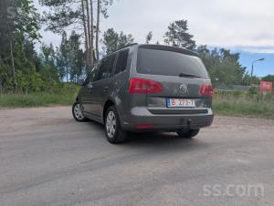 Grey Volkswagen Touran 2011 in Riga, with an engine capacity of 1.40 L and mileage of 194 thousand km for 5700 €, photo 13 on AUTOMOTO.COM.LV