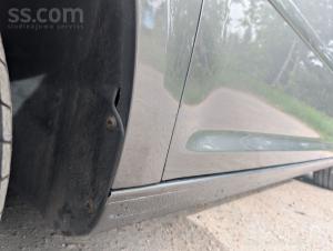 Grey Volkswagen Touran 2011 in Riga, with an engine capacity of 1.40 L and mileage of 194 thousand km for 5700 €, photo 15 on AUTOMOTO.COM.LV