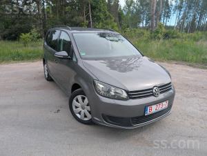 Grey Volkswagen Touran 2011 in Riga, with an engine capacity of 1.40 L and mileage of 194 thousand km for 5700 €, photo 35 on AUTOMOTO.COM.LV