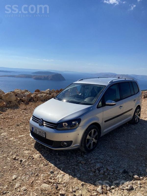 Pelēks Volkswagen Touran 2011 Jūrmala, ar dzinēja tilpumu 2.00 L un nobraukumu 313 tūkst. km par 4990 €, foto 9 vietnē AUTOMOTO.COM.LV