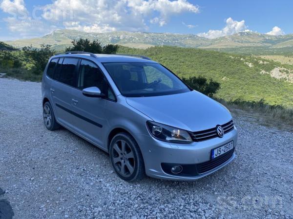 Pelēks Volkswagen Touran 2011 Jūrmala, ar dzinēja tilpumu 2.00 L un nobraukumu 313 tūkst. km par 4990 €, foto 10 vietnē AUTOMOTO.COM.LV