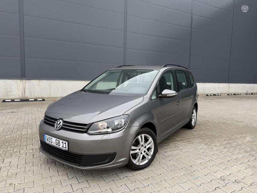 Grey Volkswagen Touran 2011 in Siauliai, with an engine capacity of 1.39 L and mileage of 208 thousand km for 3690 €, photo 1 on AUTOMOTO.COM.LV