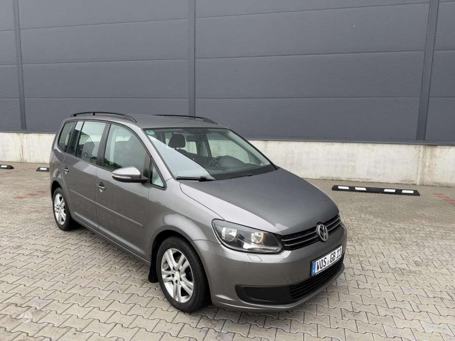 Grey Volkswagen Touran 2011 in Siauliai, with an engine capacity of 1.39 L and mileage of 208 thousand km for 3690 €, photo 3 on AUTOMOTO.COM.LV