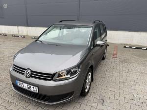 Grey Volkswagen Touran 2011 in Siauliai, with an engine capacity of 1.39 L and mileage of 208 thousand km for 3690 €, photo 11 on AUTOMOTO.COM.LV