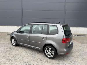 Grey Volkswagen Touran 2011 in Siauliai, with an engine capacity of 1.39 L and mileage of 208 thousand km for 3690 €, photo 12 on AUTOMOTO.COM.LV