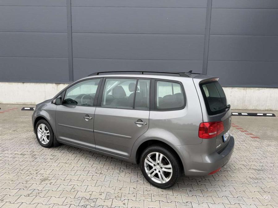 Grey Volkswagen Touran 2011 in Siauliai, with an engine capacity of 1.39 L and mileage of 208 thousand km for 3690 €, photo 12 on AUTOMOTO.COM.LV
