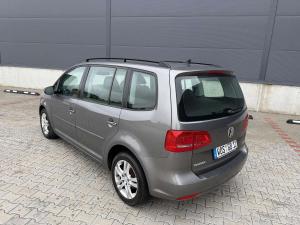 Grey Volkswagen Touran 2011 in Siauliai, with an engine capacity of 1.39 L and mileage of 208 thousand km for 3690 €, photo 14 on AUTOMOTO.COM.LV