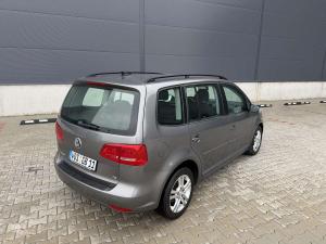 Grey Volkswagen Touran 2011 in Siauliai, with an engine capacity of 1.39 L and mileage of 208 thousand km for 3690 €, photo 15 on AUTOMOTO.COM.LV