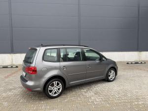 Grey Volkswagen Touran 2011 in Siauliai, with an engine capacity of 1.39 L and mileage of 208 thousand km for 3690 €, photo 17 on AUTOMOTO.COM.LV